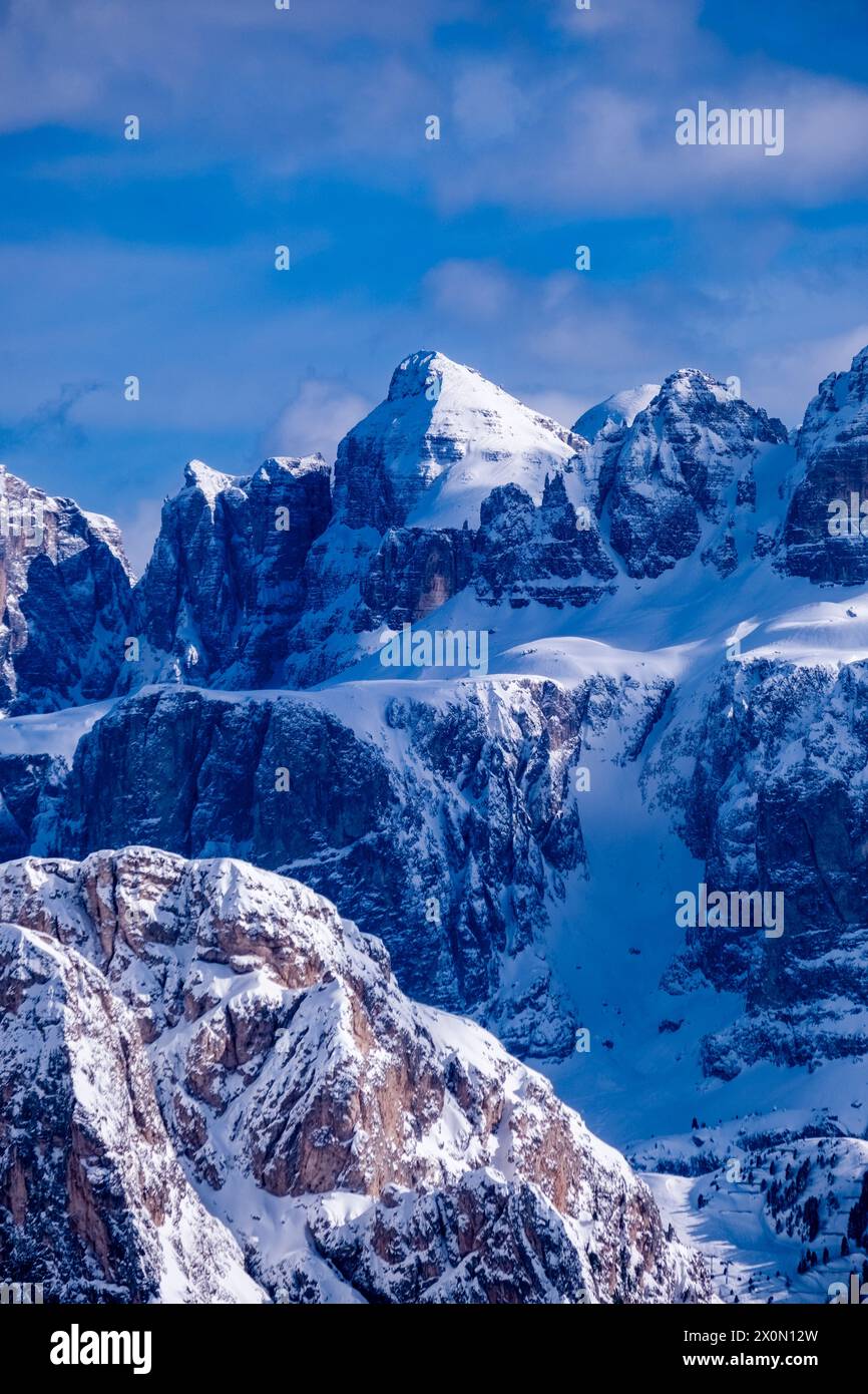 The snow-covered summit of Cima Pisciadù of the Sella group in winter ...