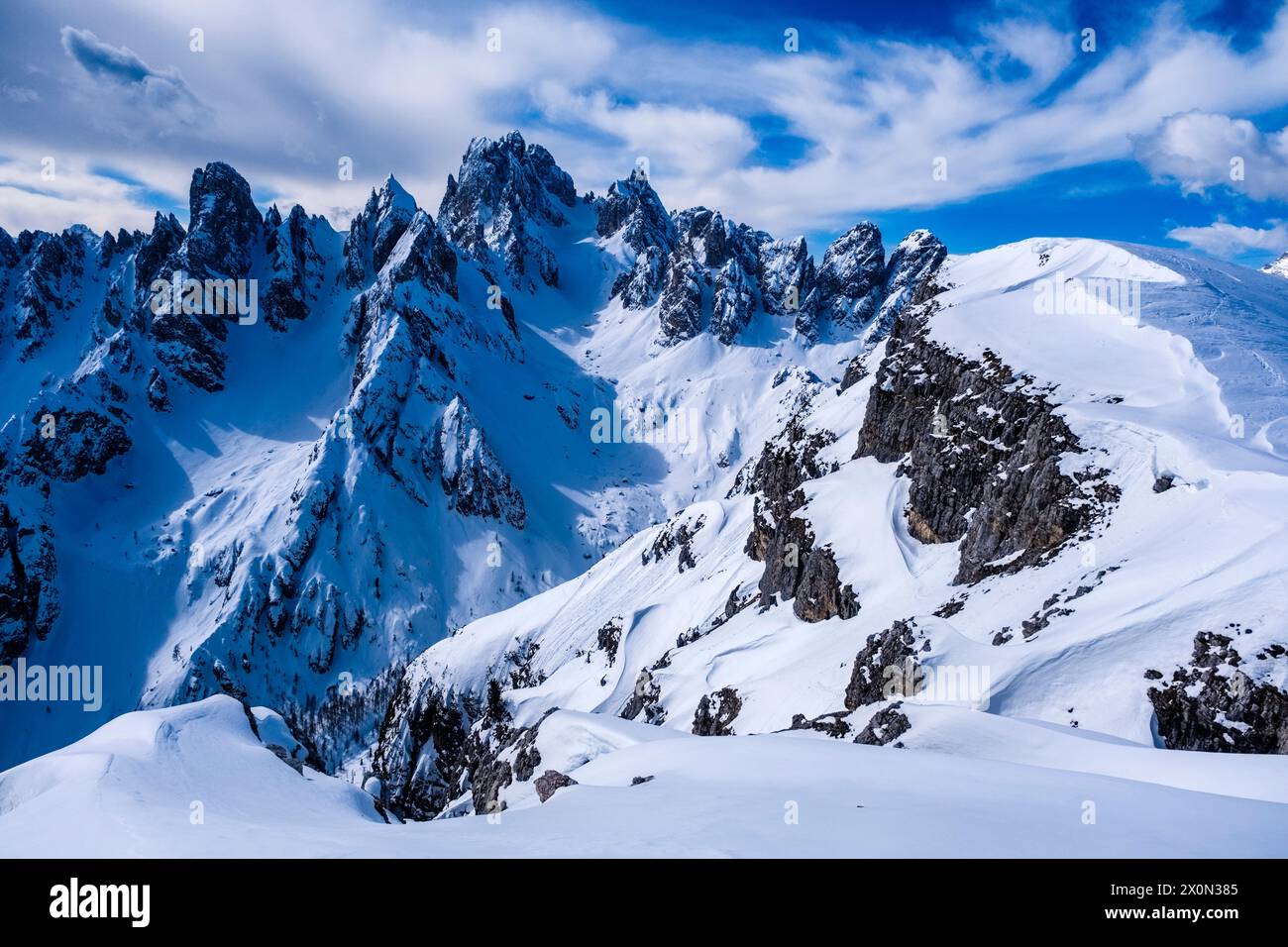 Snowdrift creating artful structures in Tre Cime Natural Park in winter ...