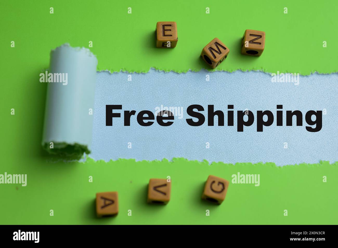 Concept of Free Shipping Text written in torn paper Stock Photo - Alamy