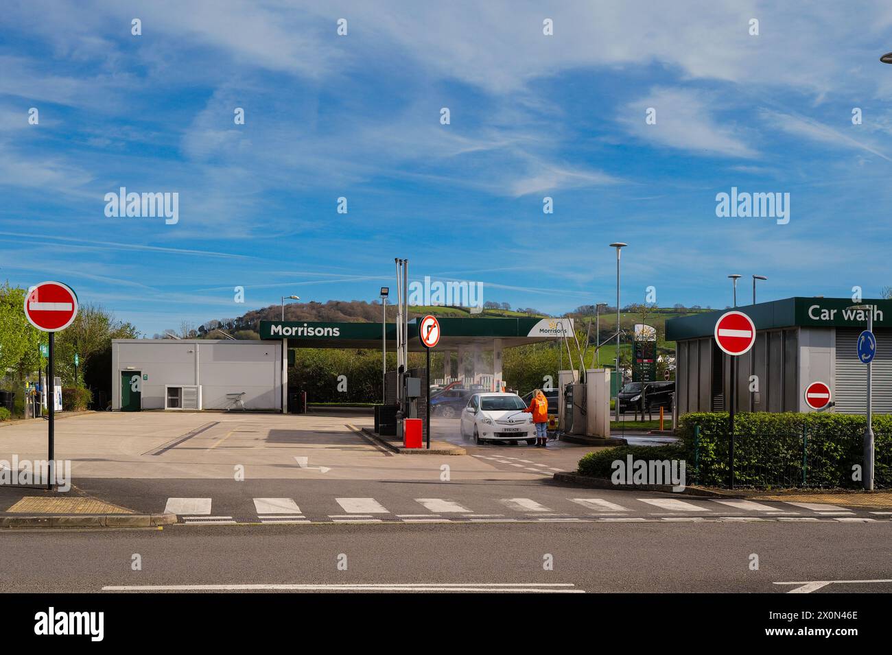 Morrisons supermarket petrol and diesel station with a female at the ...
