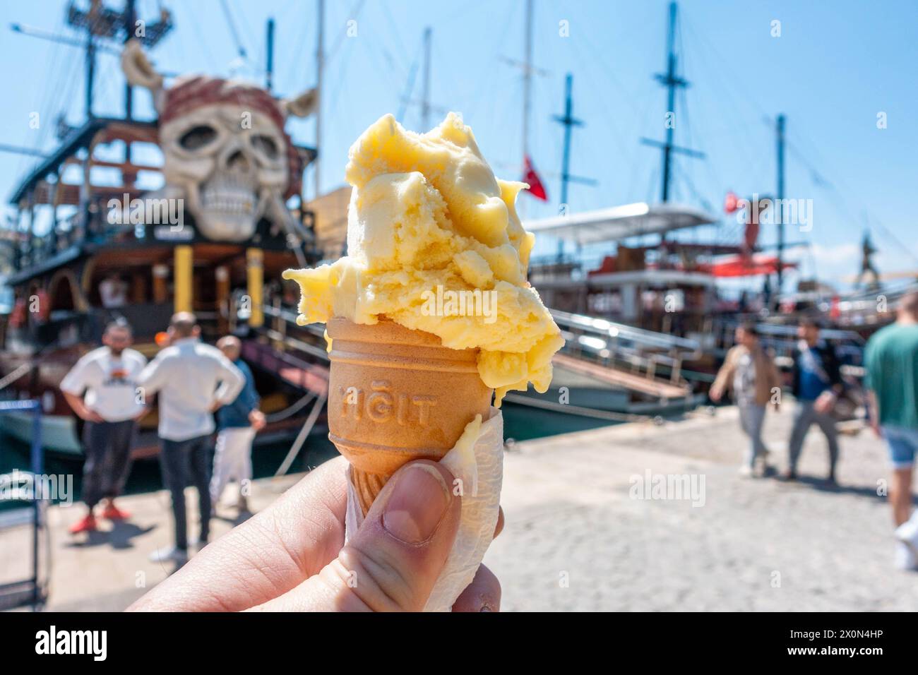 Enjoying an ice cream cone at the touristy harbour in Antalya, Turkey ...