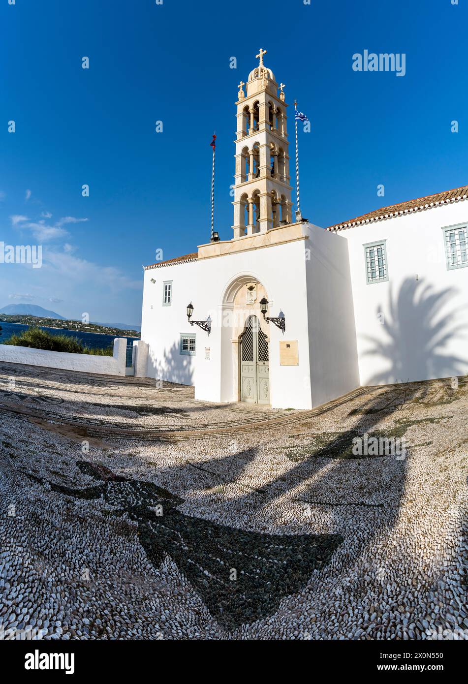 The church of Saint Nicholas (Agios Nikolaos), with its cobbled ...