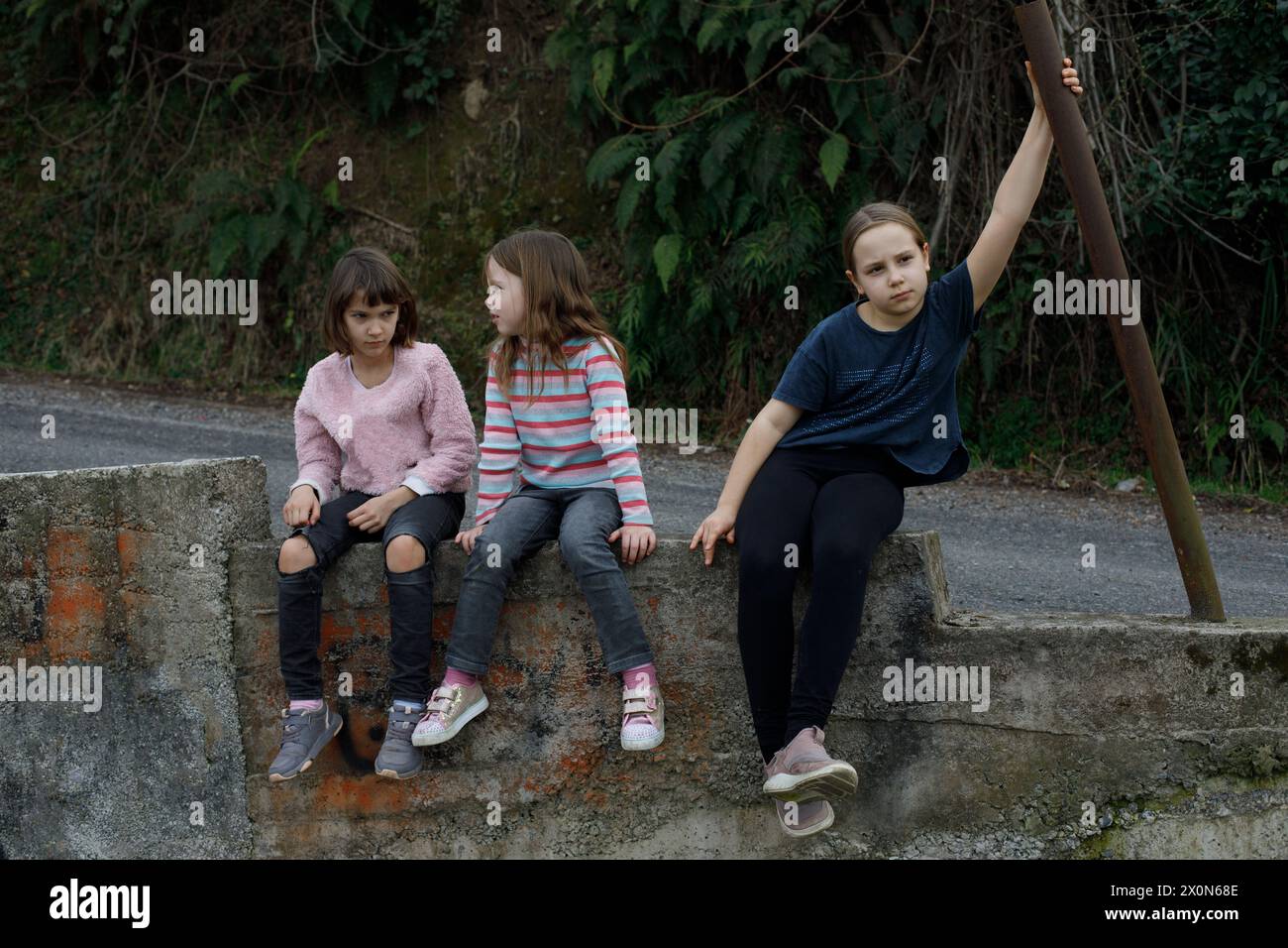 Bored children. Cute little girl outdoor Stock Photo - Alamy