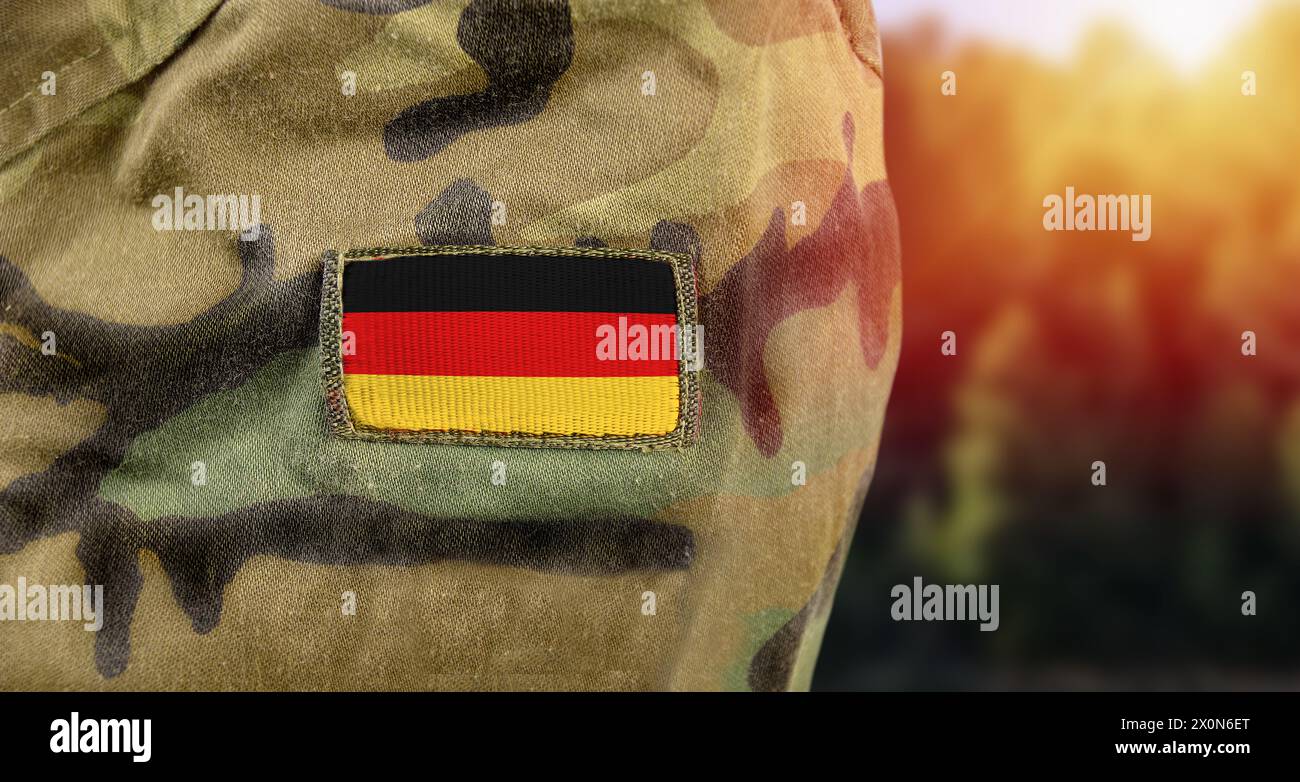 Germany flag on german army uniform at outdoor Stock Photo - Alamy