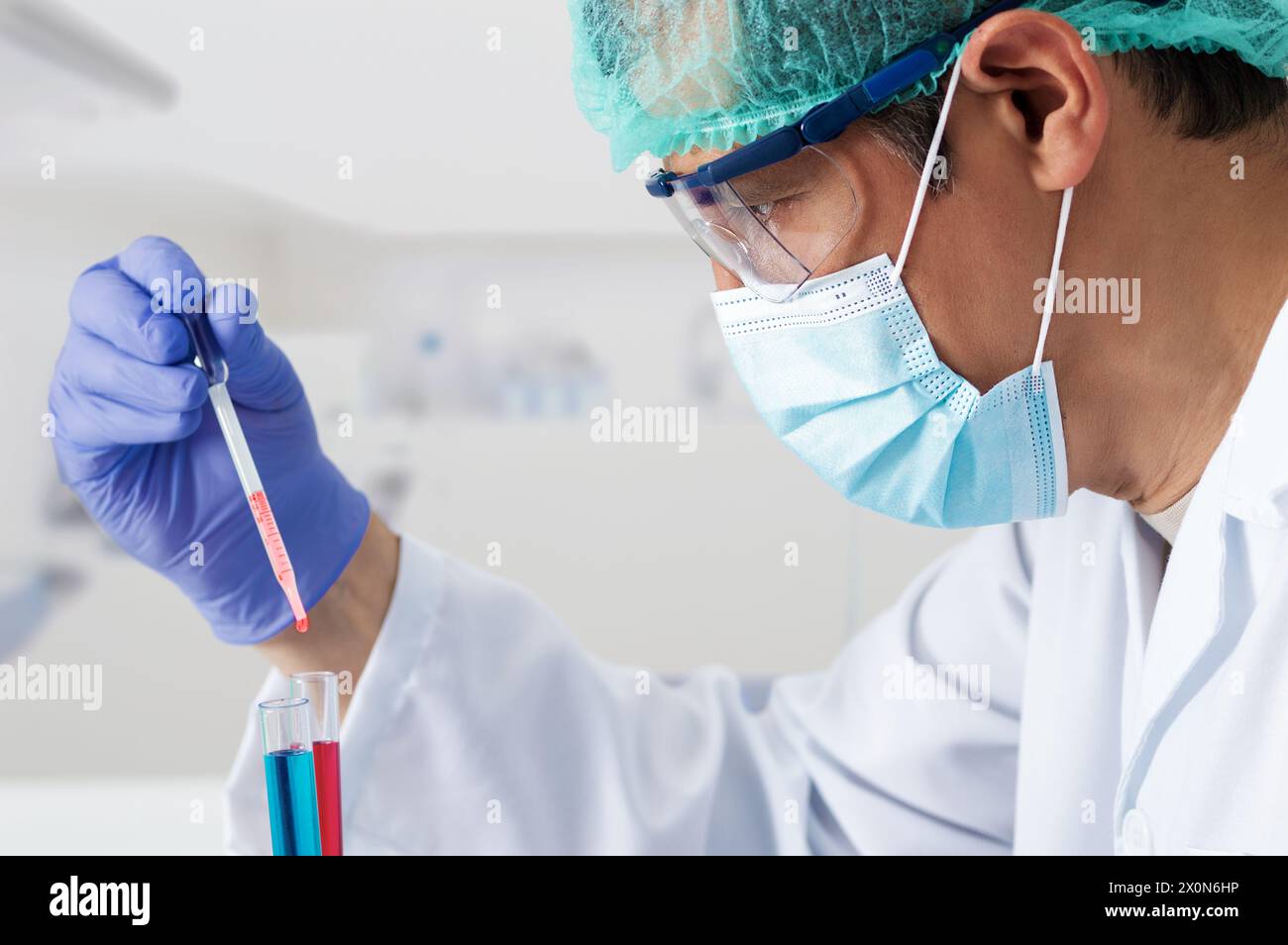 Scientist conducting an experiment hi-res stock photography and images ...