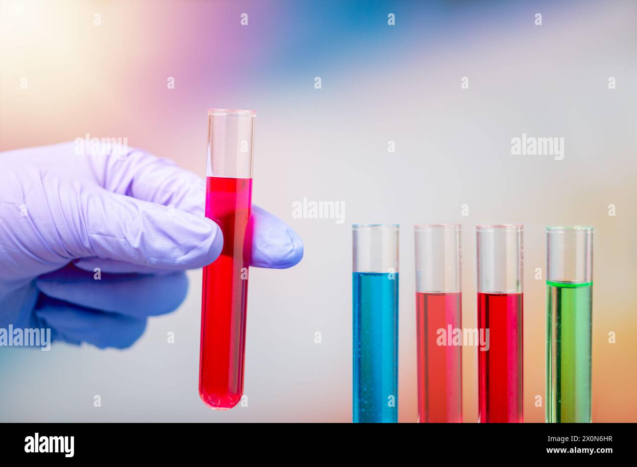 Scientist holding tube test hi-res stock photography and images - Alamy