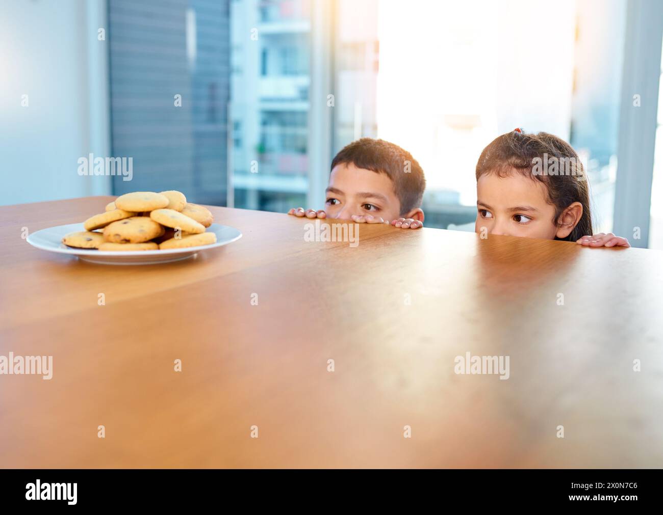 Kid stealing cookie hi-res stock photography and images - Alamy