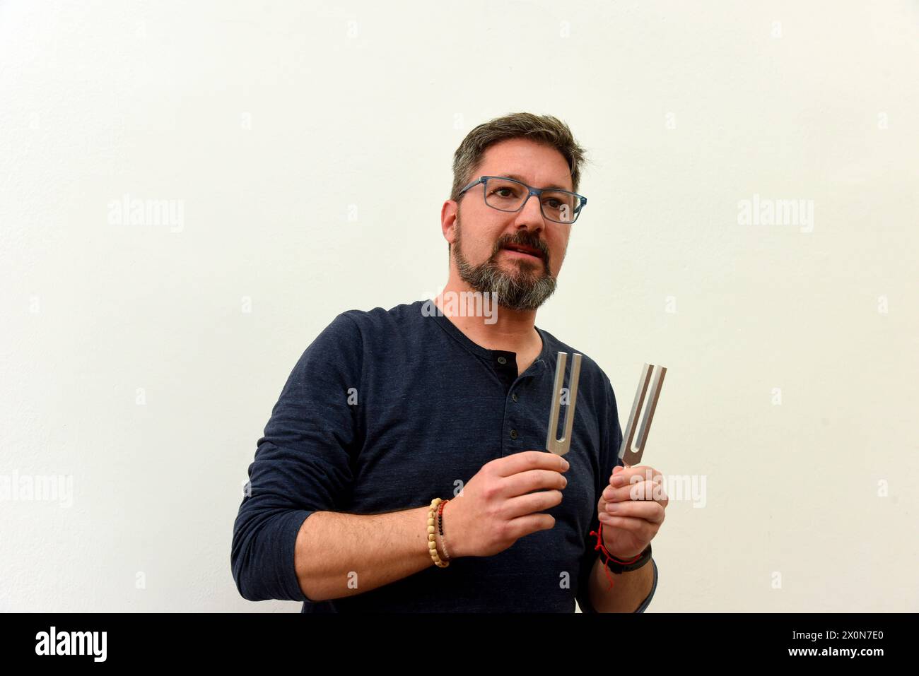 The Spanish musician and sound therapist Alex Vert shows some tuning ...