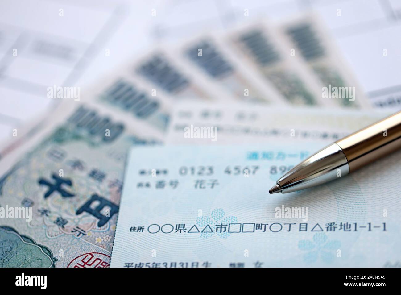 Japanese my number card specimen and notification card on calendar ...