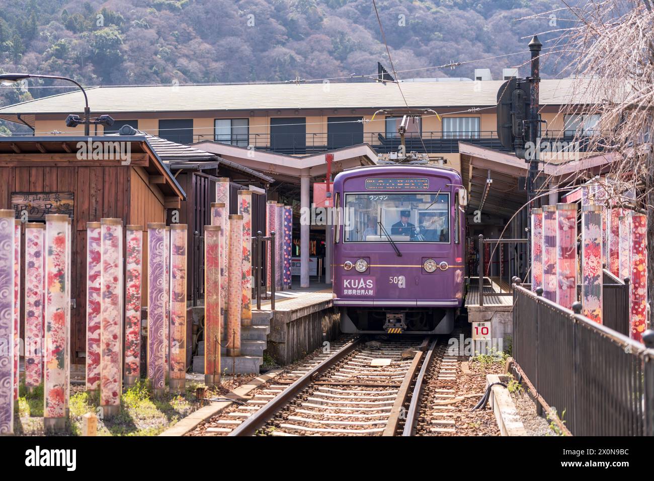 Kyoto, Japan - March 29 2024 : Train stop at Arashiyama station with ...