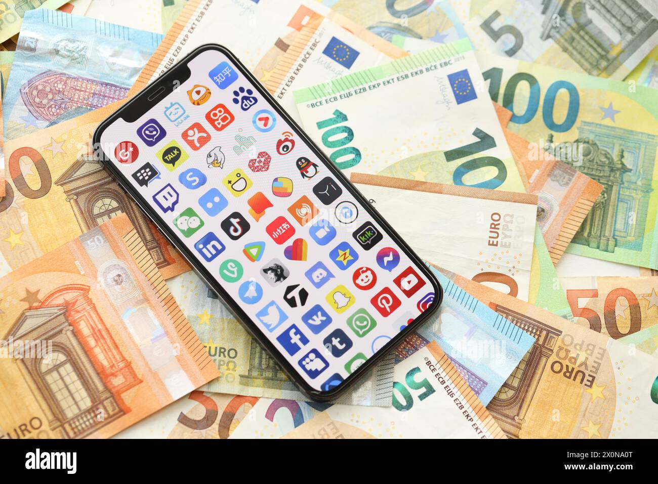 KYIV, UKRAINE - APRIL 1, 2024 Many apps icon on smartphone screen on ...