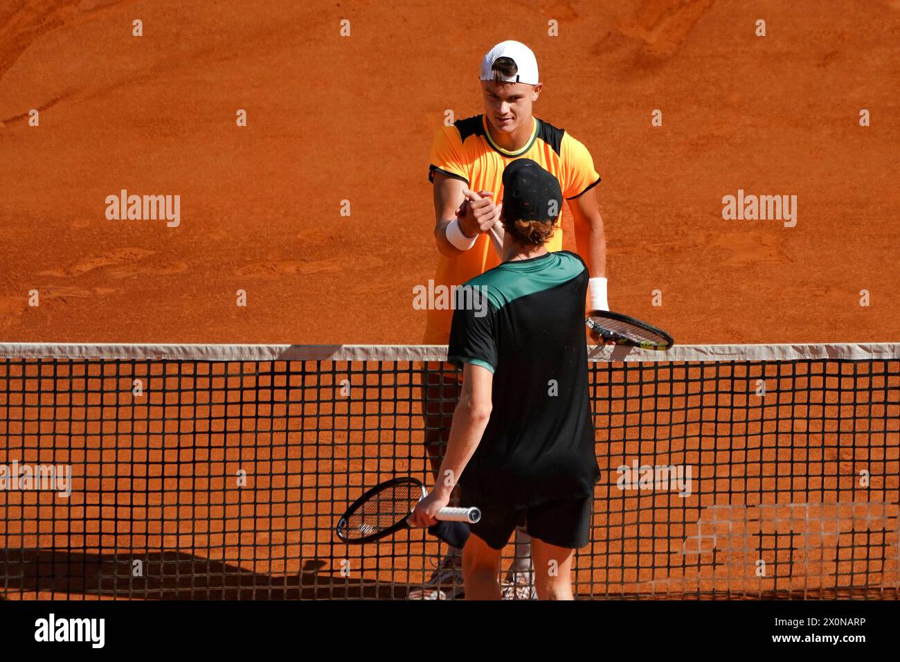 MONTE-CARLO, MONACO - APRIL 12: Jannik Sinner of Italy against Holger Rune of Denmark in their ...