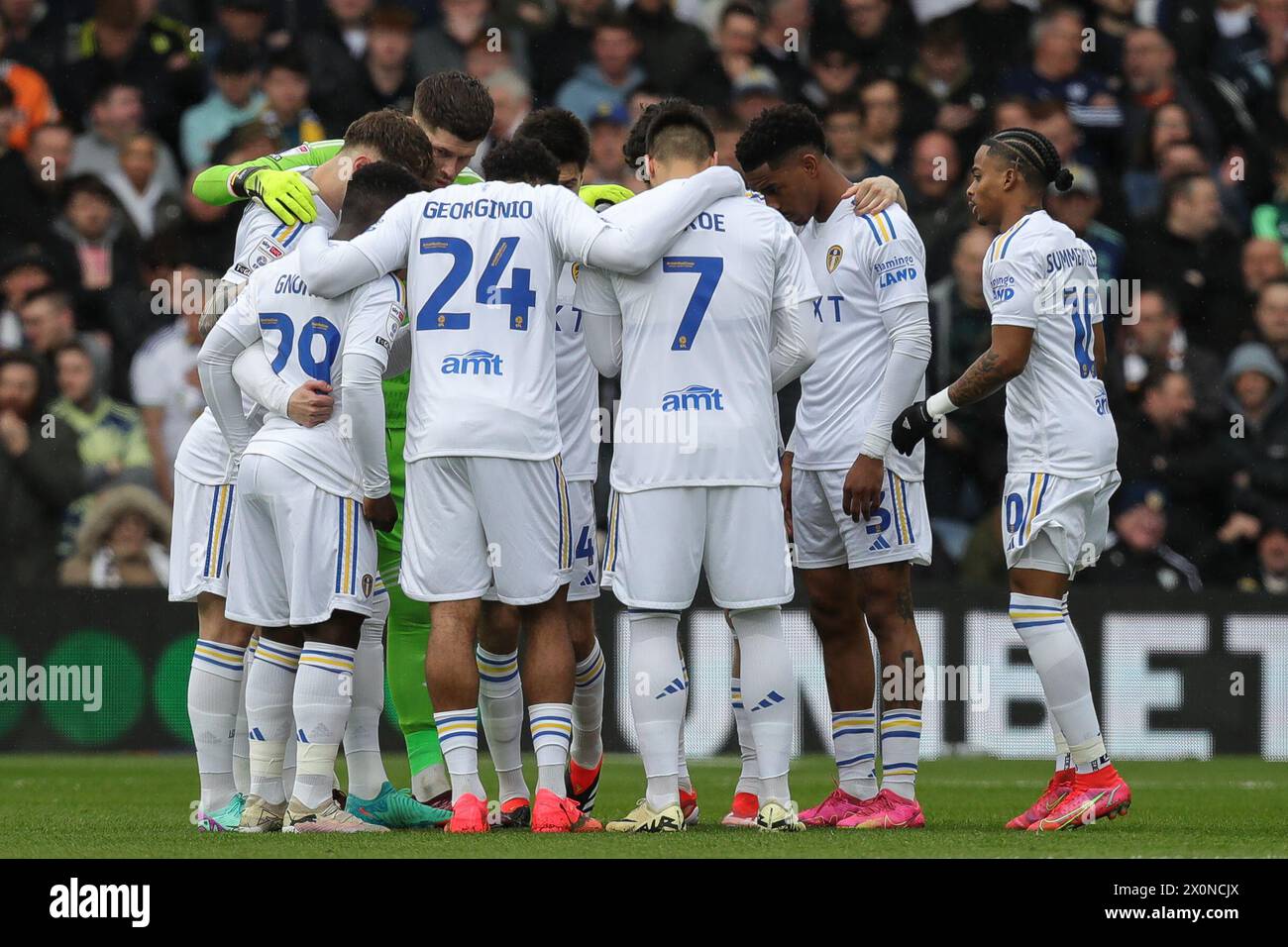 Leeds United squad huddle before kick off during the Sky Bet ...