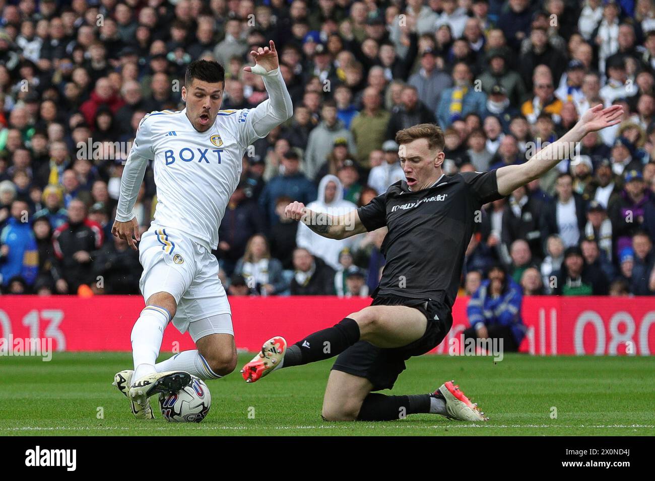 Hayden Carter of Blackburn Rovers puts in a vital challenge on the ...