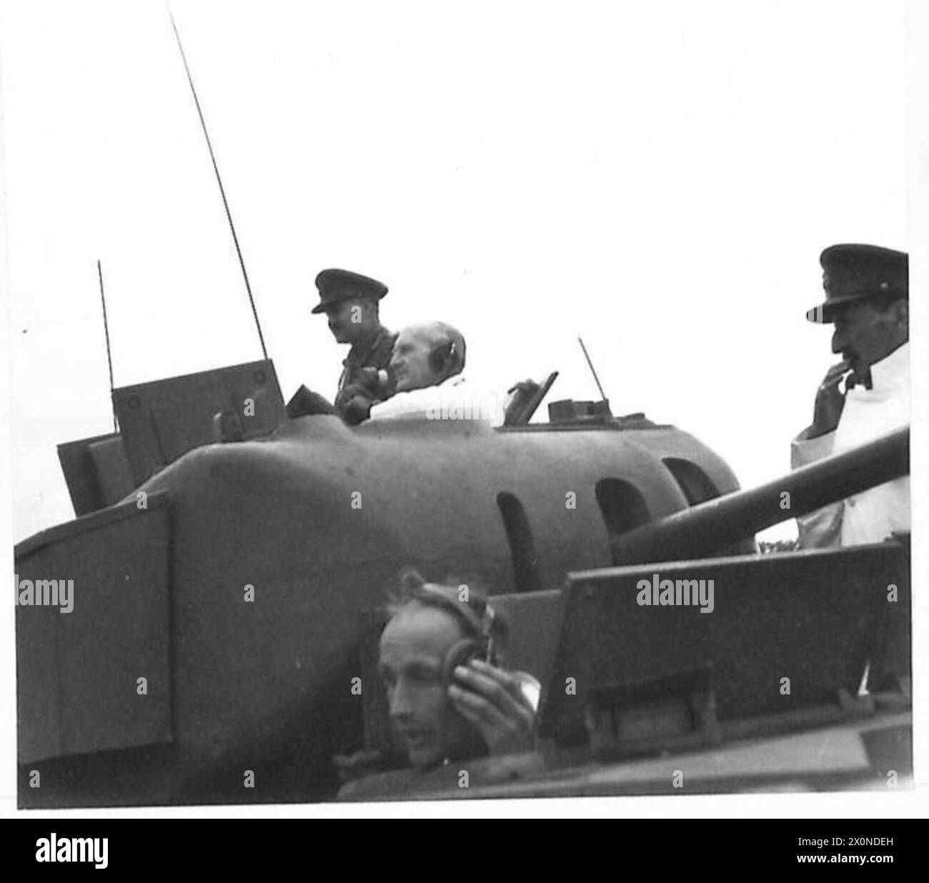 Prime Minister Churchill rides in a tank while General Sir John Dill ...