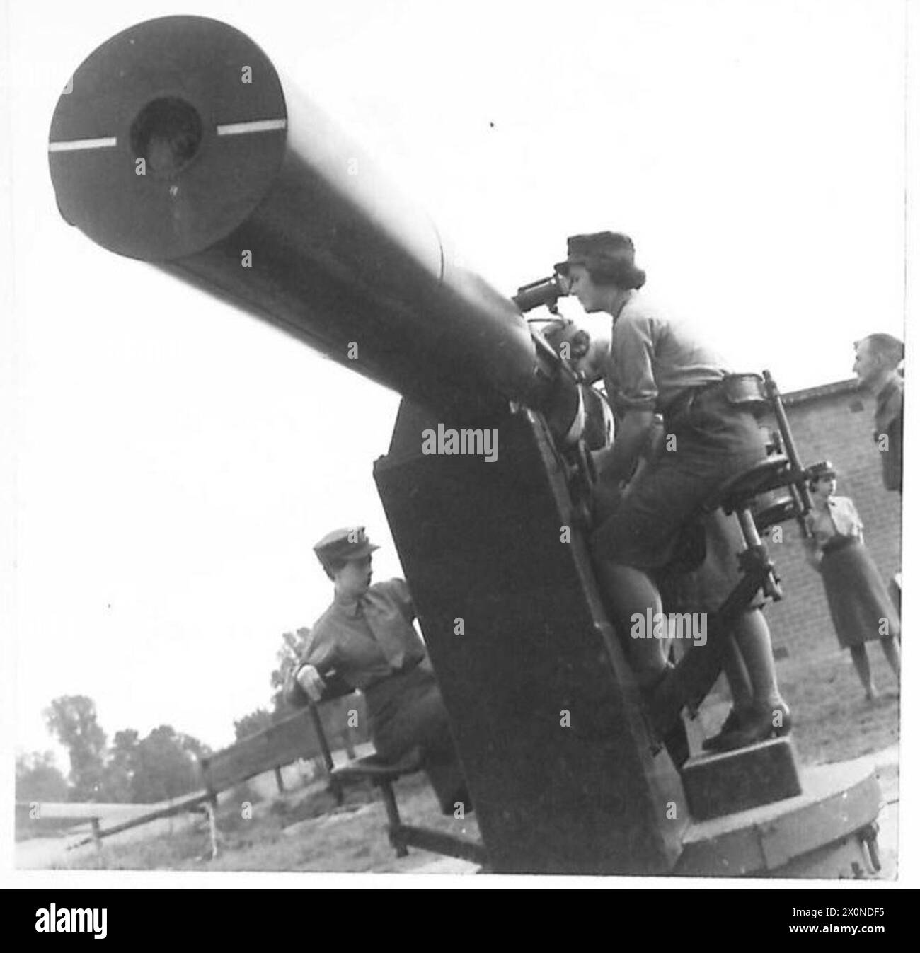 ATS members work on a height and range finder at an Anti-Aircraft ...