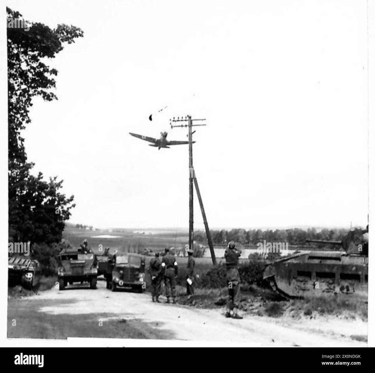 MOCK INVASION - An "enemy" column being dive-bombed. Photographic ...