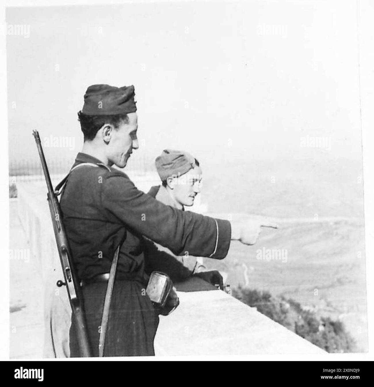 EIGHTH ARMY : THE TOWN OF SAN MARINO TODAY - An Italian soldier points ... EIGHTH ARMY : THE TOWN OF SAN MARINO TODAY - An Italian soldier points ...