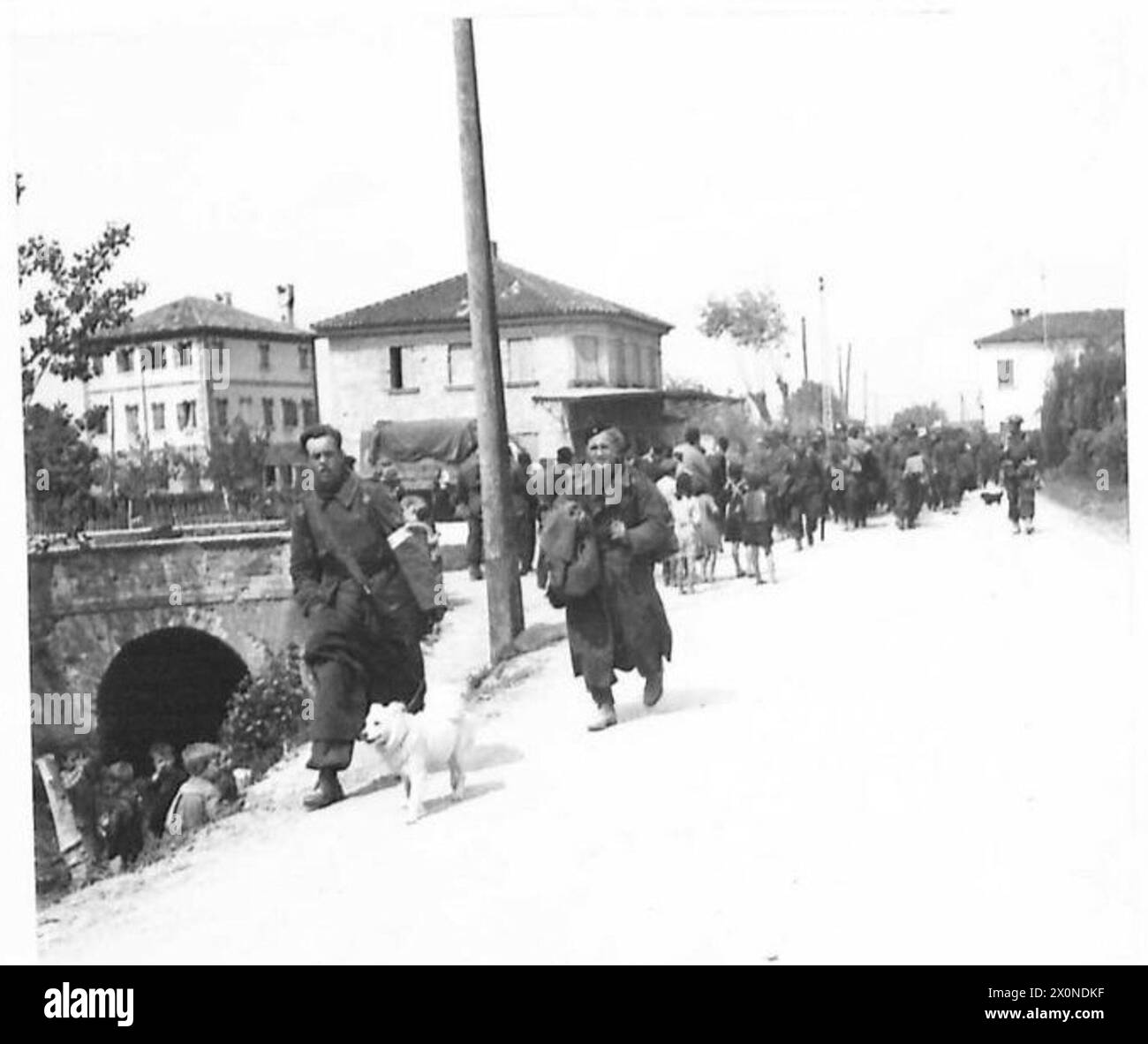 EIGHTH ARMY : GERMAN PRISONERS ROLL IN - German stragglers, carrying ...
