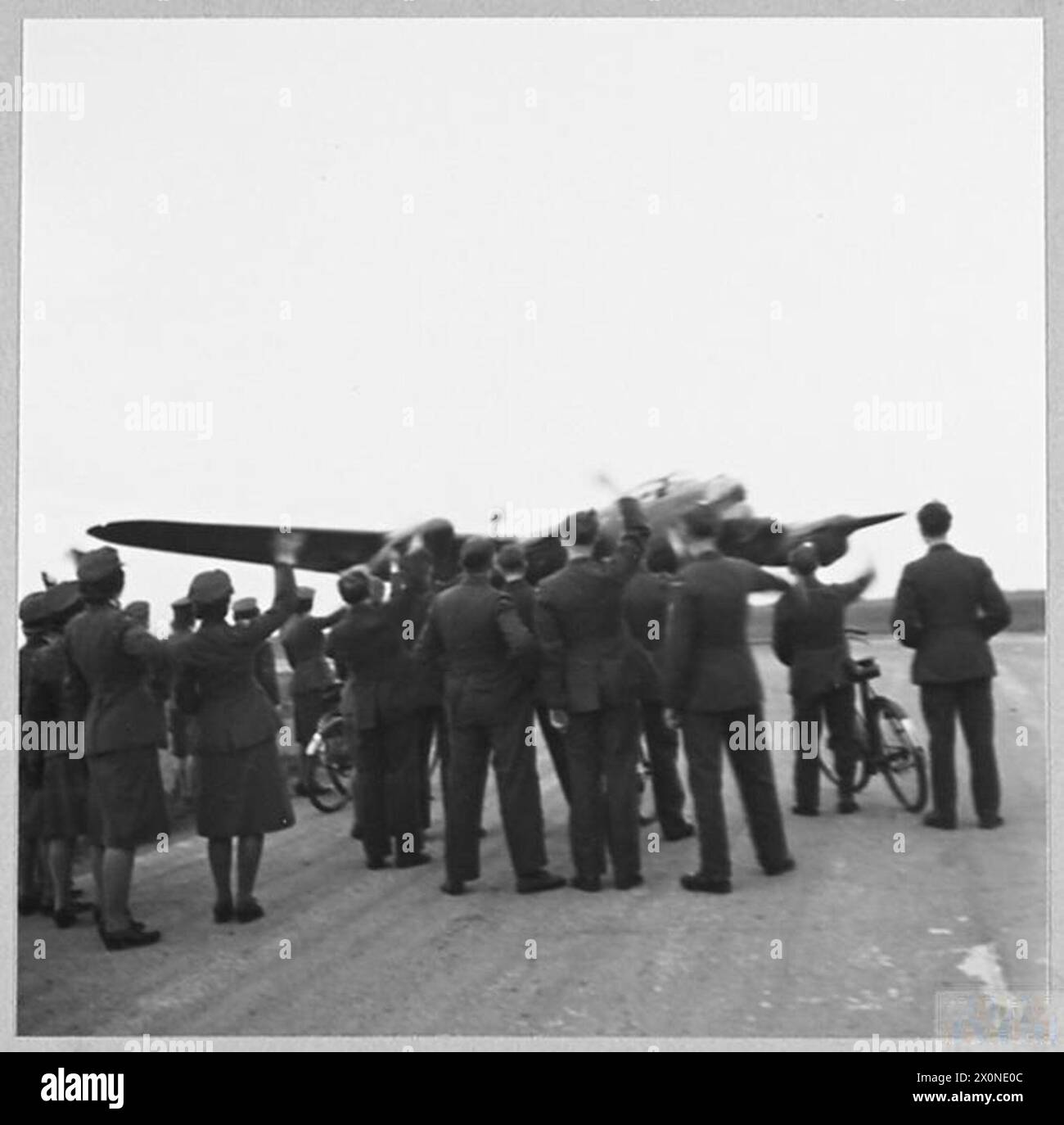 A LANCASTER COMES HOME - AND PREPARES TO STRIKE AGAIN - For story see ...