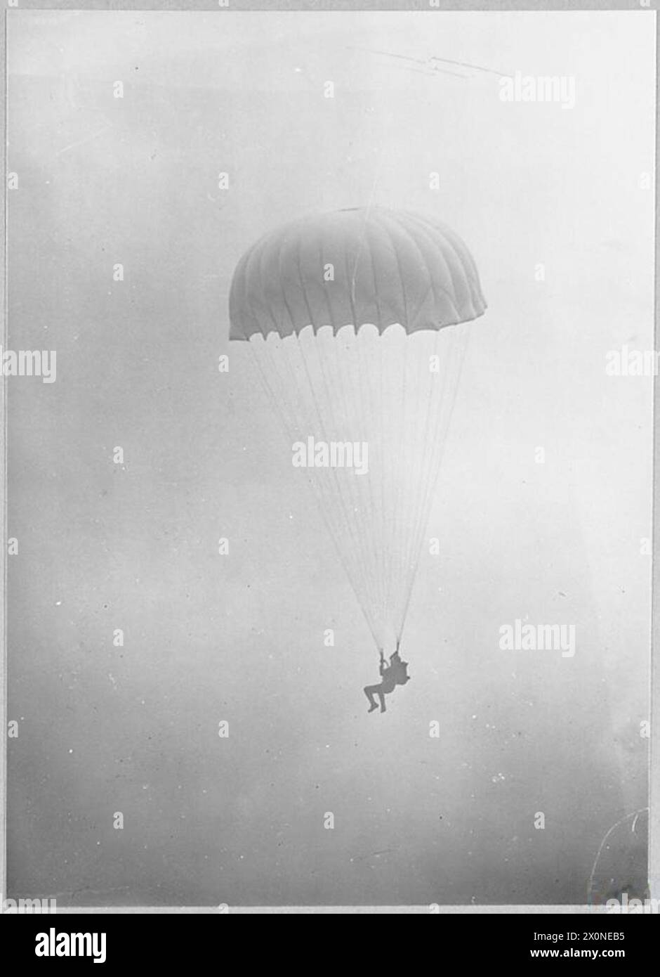 British paratroopers are shown descending by parachute during airborne ...