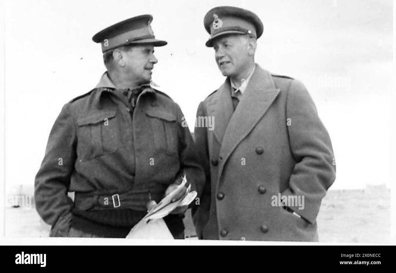 Lieut. General Willoughby Norrie converses with Major General I. de ...