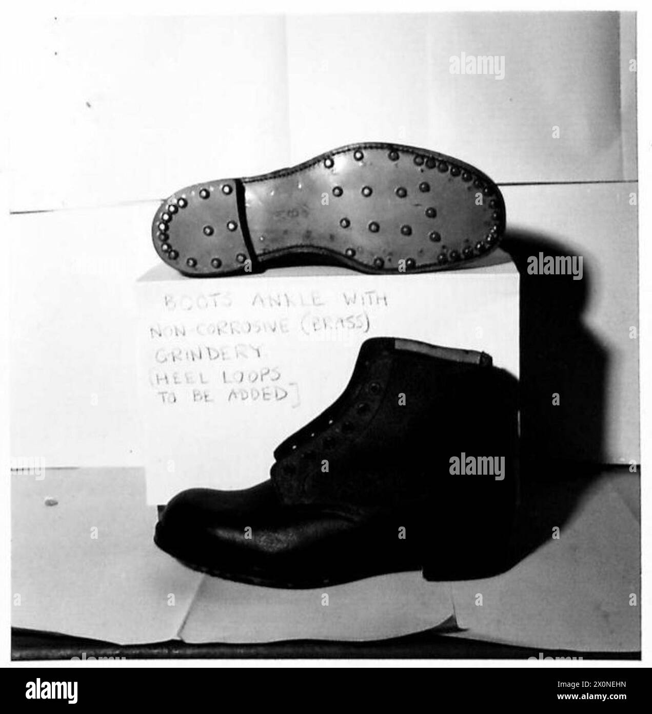 Photographs showing Army boots, a towel, and undergarments ...