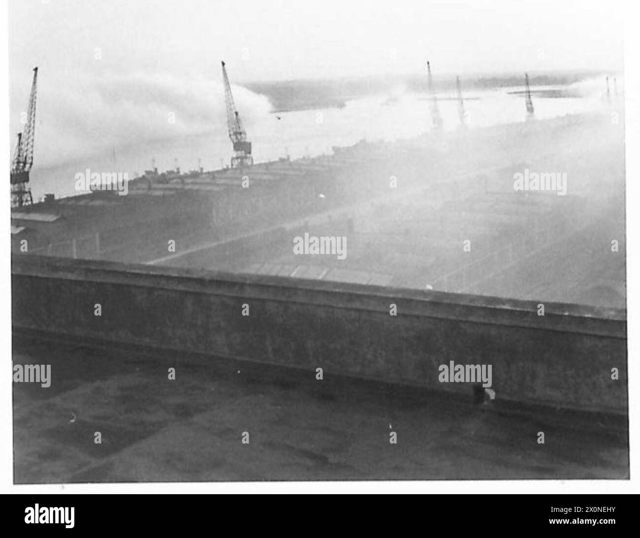 Personnel conduct a smoke screen test, displaying containers and ...