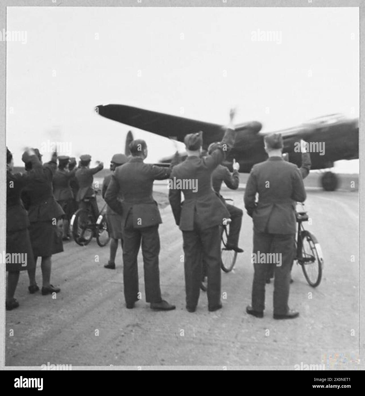 A LANCASTER COMES HOME - AND PREPARES TO STRIKE AGAIN - For story see ...