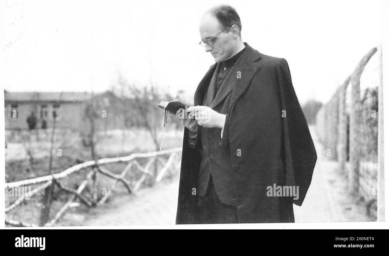CIVILIAN EVACUATION FROM BRITISH OCCUPIED GERMANY. - A Priest reading ...