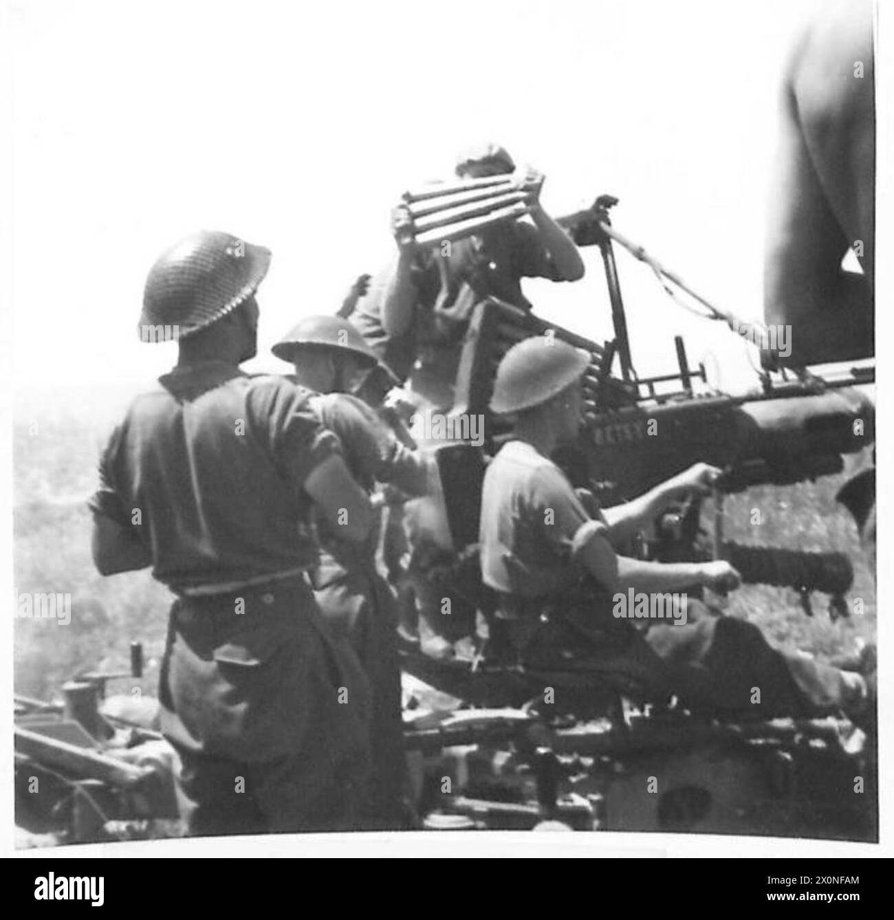 Photograph showing 'C' Troop 313 Battery of the 90th L.A.A. operating a ...