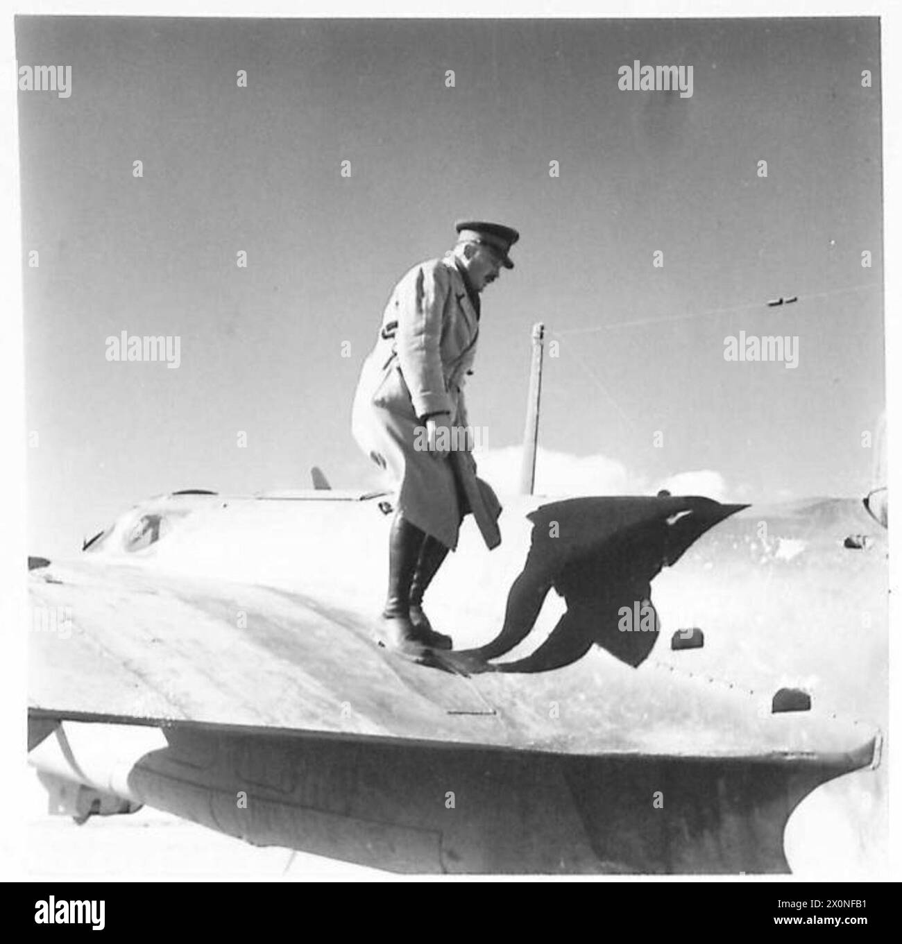 Lieutenant General Ritchie disembarks from his plane during a visit to ...