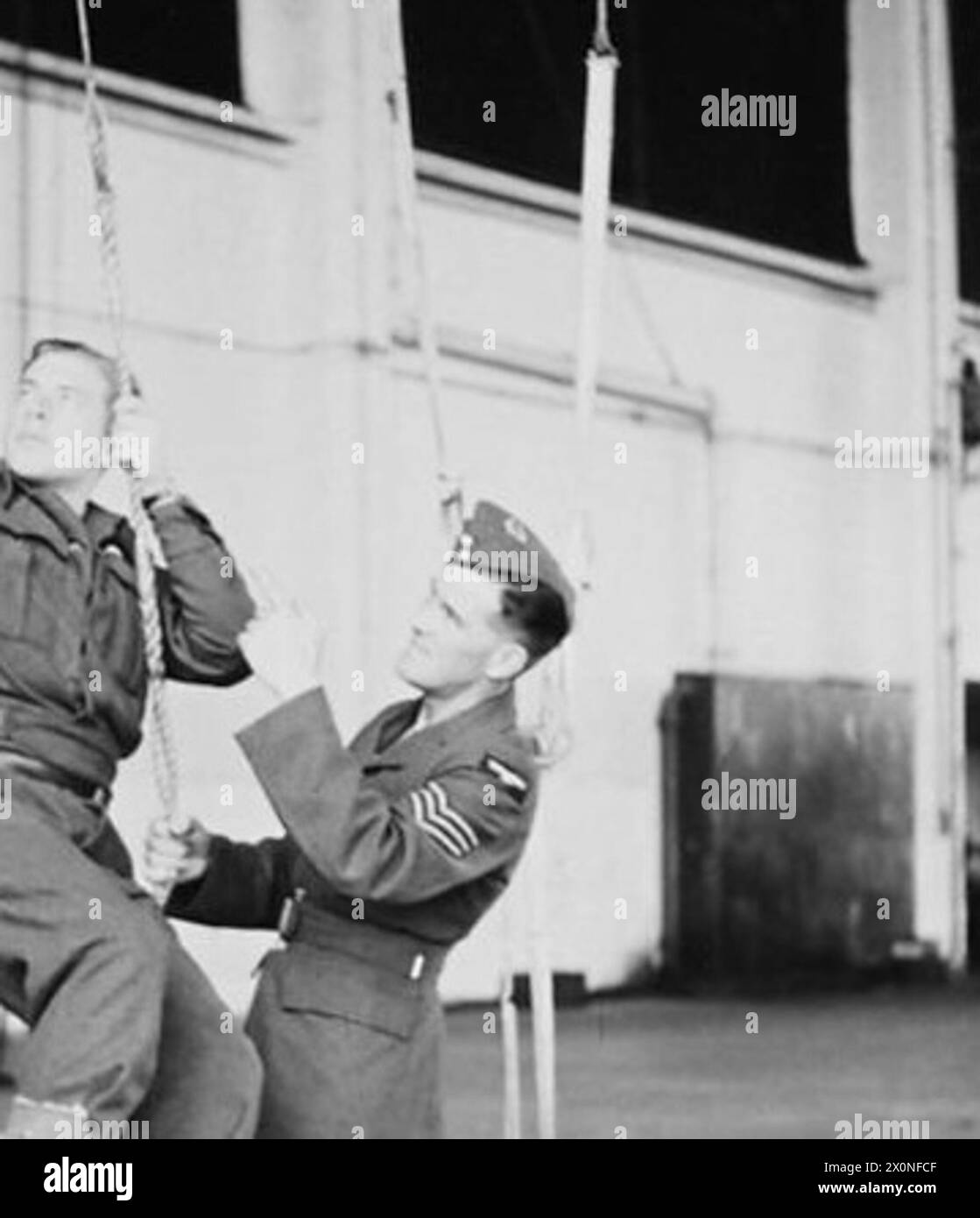 RAF trainee bomber pilots receive parachute jumping lessons, learning ...