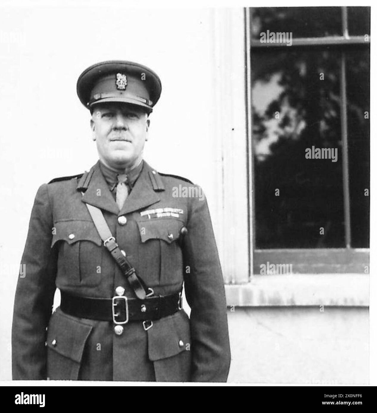 Brigadier J.L. Short, OBE, commander of the 176 Infantry Brigade, is ...