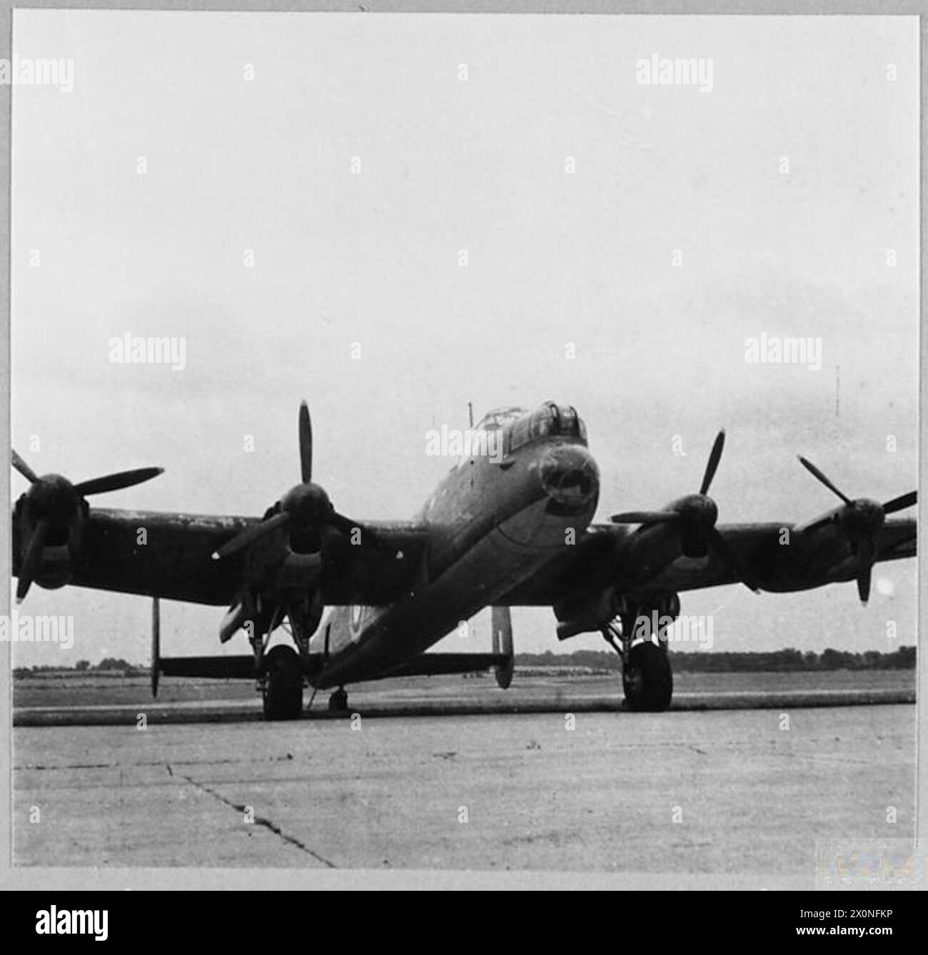 Photograph showing an Avro Lancaster four-engined bomber, highlighting ...