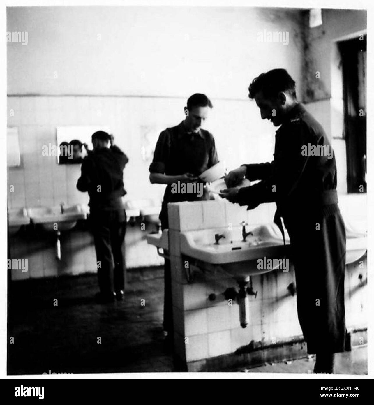 Photograph showing one of the washing rooms at Oflag 79 in Brunswick ...