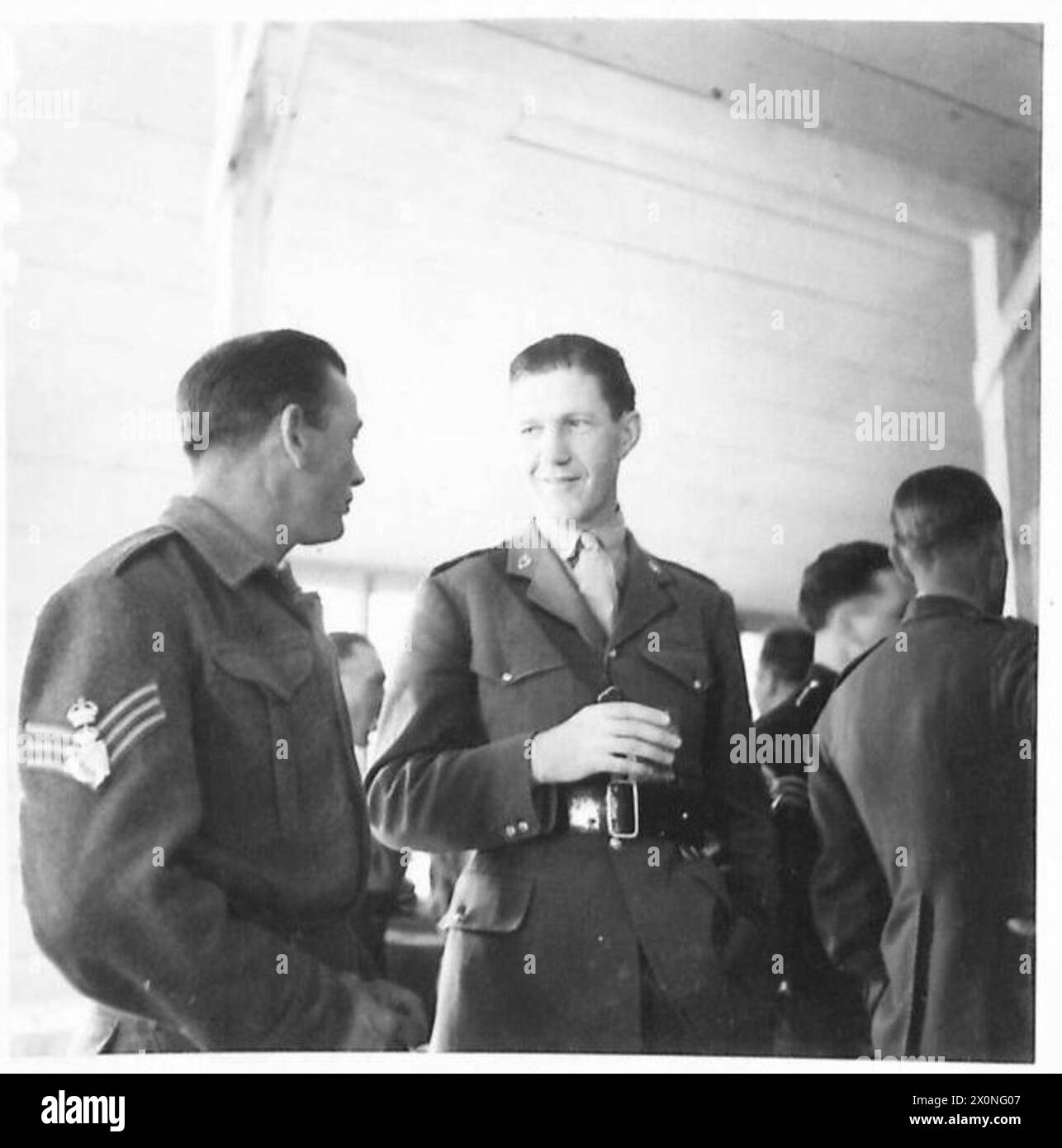 Officers entertain sergeants in the officers' mess during British Army ...
