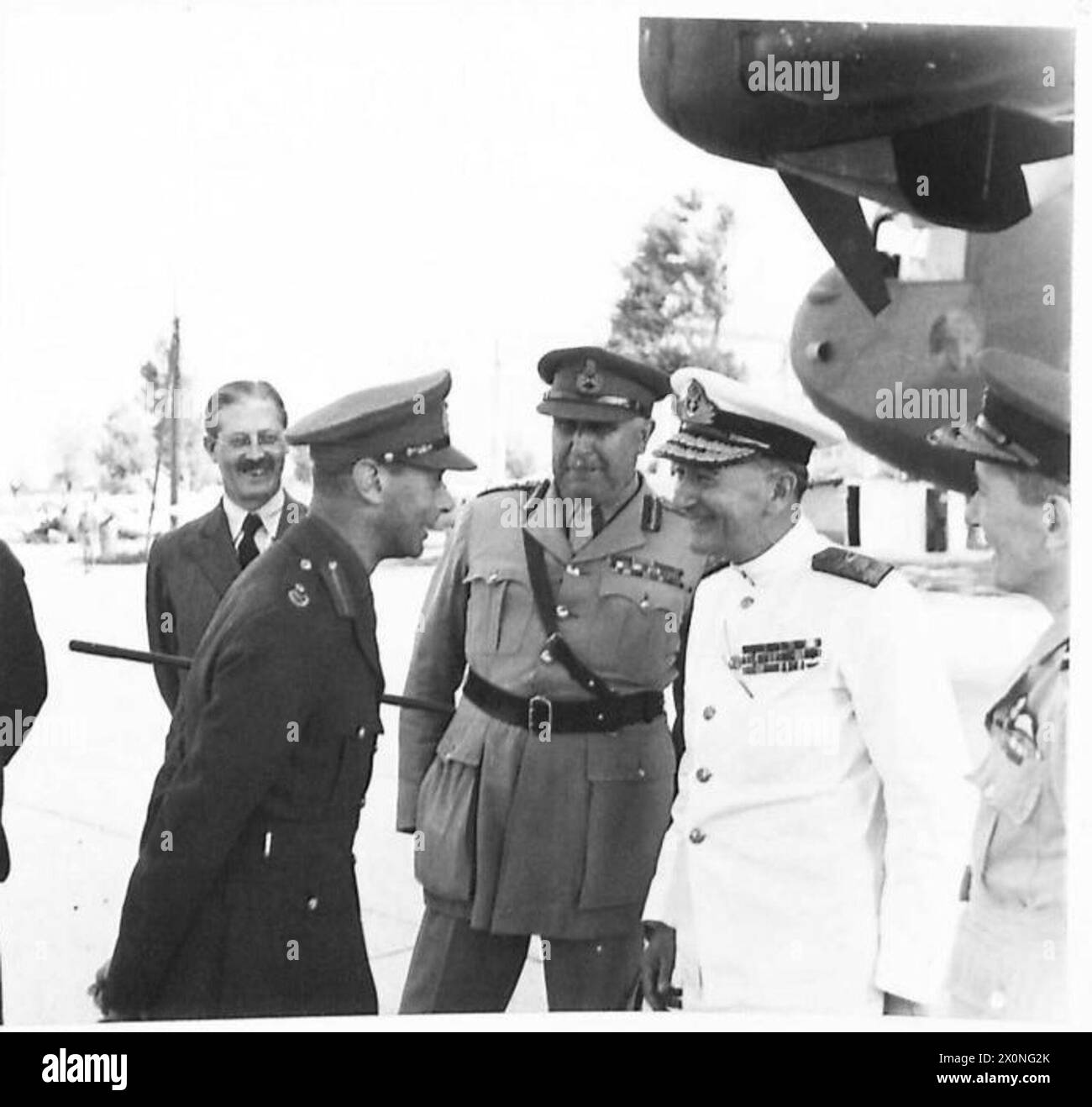 H.M. THE KING IN ITALY - H.M. the King chatting with Admiral Sir John ...