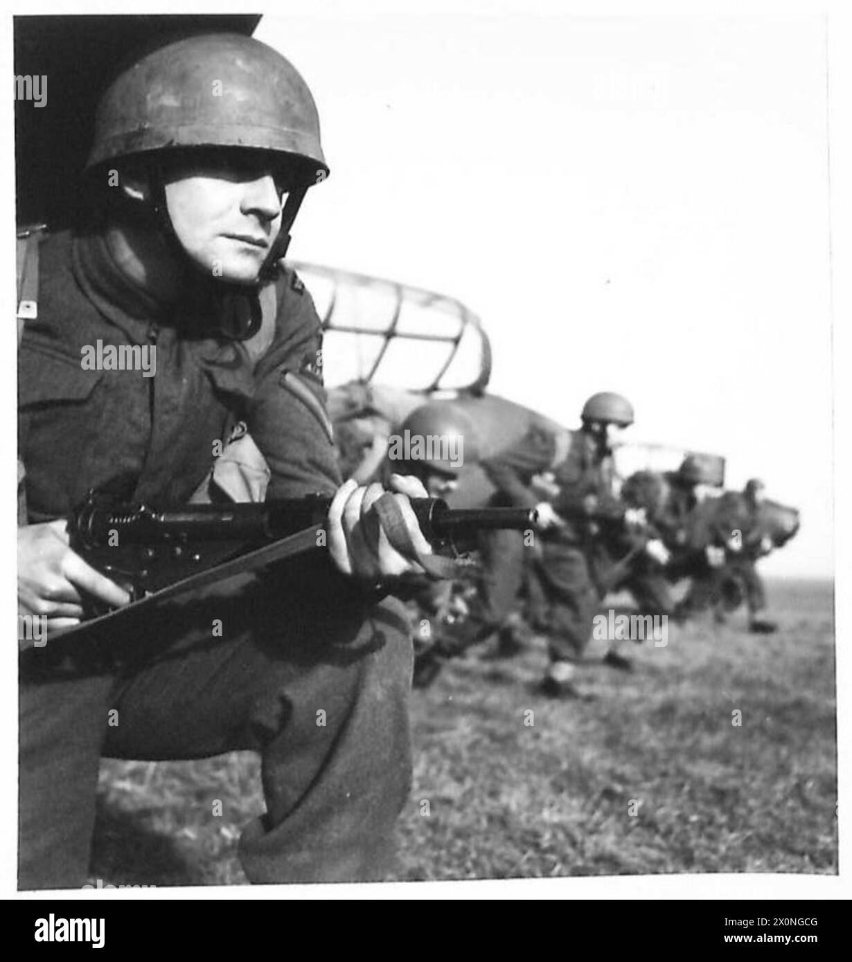 Glider crews leave the wings and rush to attack the designated 'enemy ...