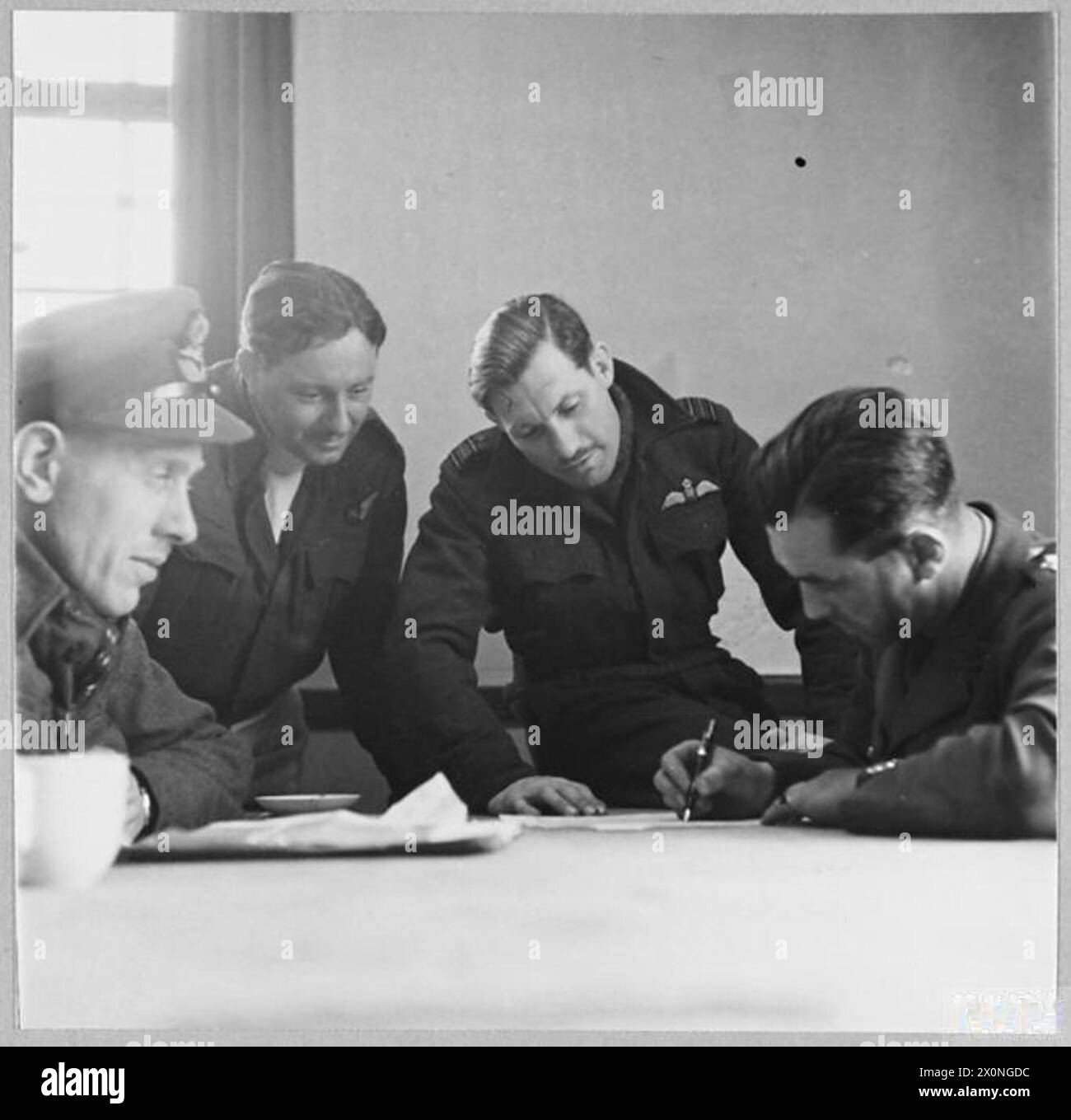 An Army Liaison officer from Army Cooperation Command receives reports ...