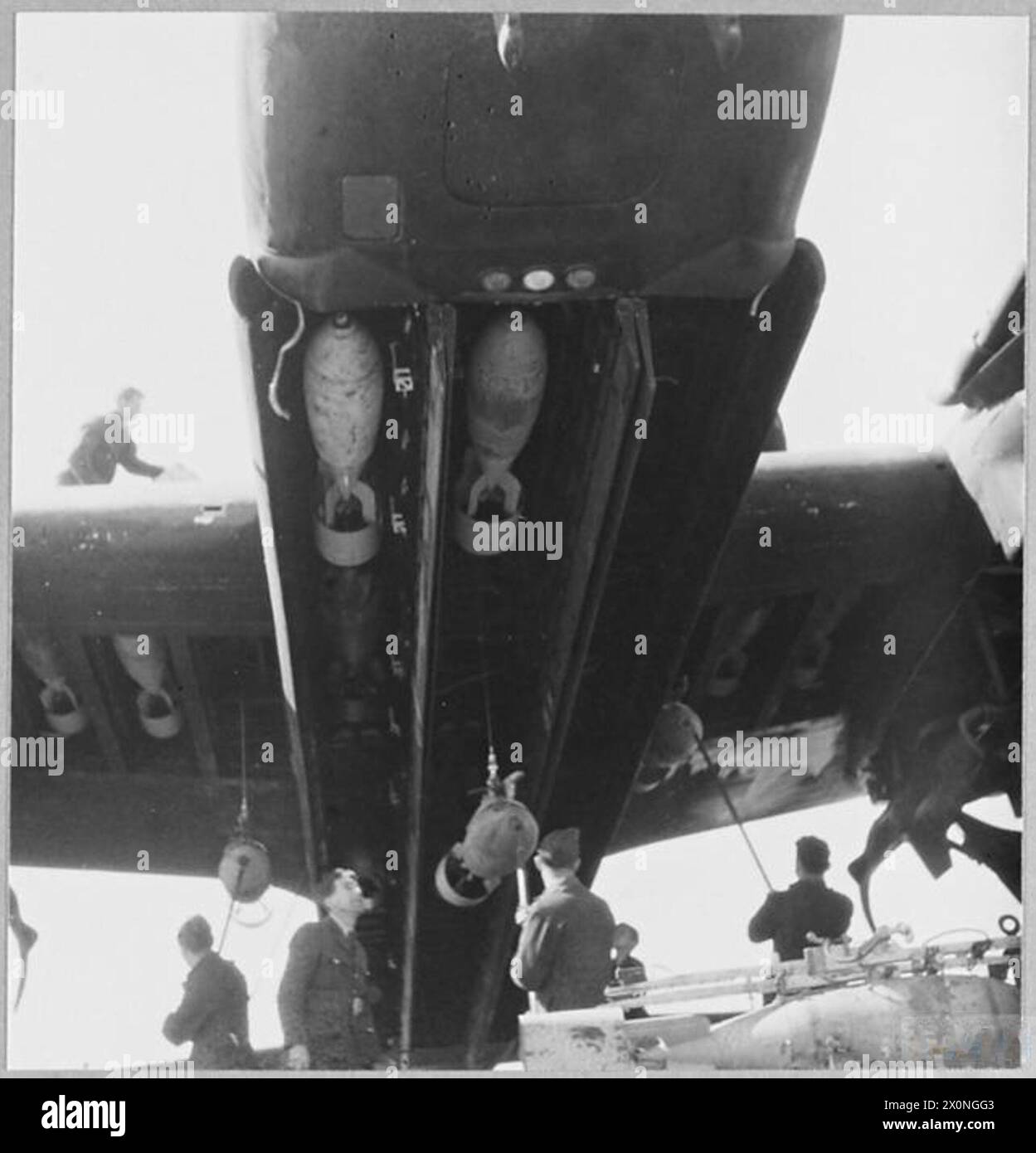 HUGE BOMB-CARRYING CAPACITY OF R.A.F. STIRLING AIRCRAFT - Bombing up a ...