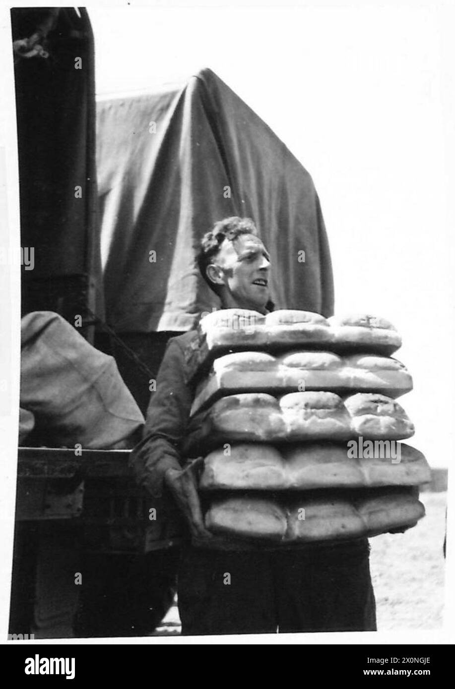 THE BRITISH ARMY IN NORTH-WEST EUROPE 1944-1945 - Bread arriving for ...