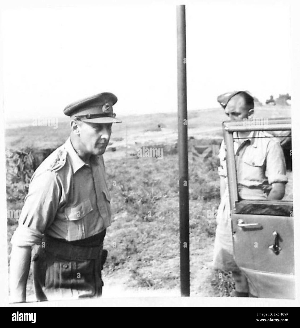 General Anderson walks to his car at the start of his daily work during ...