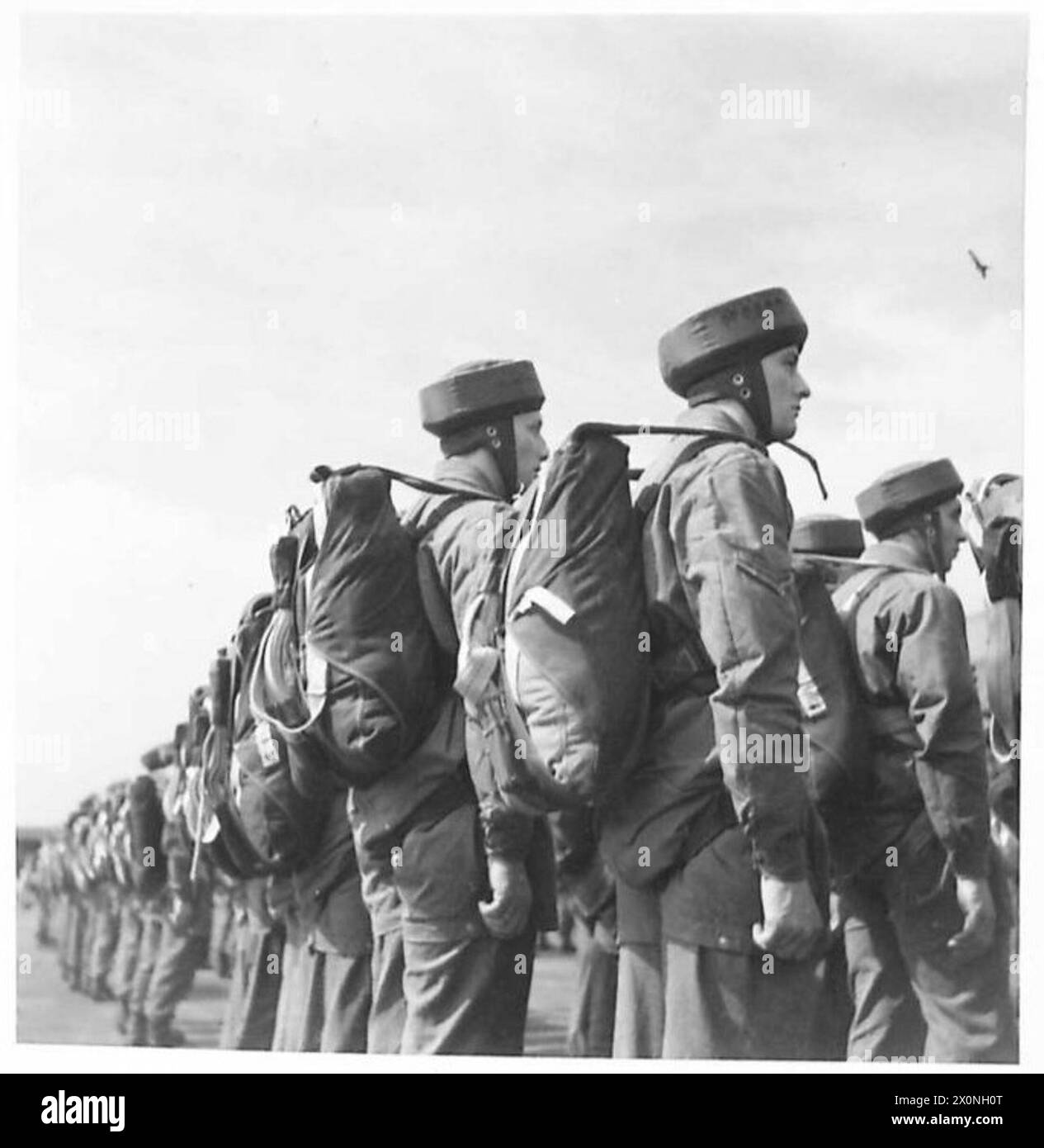 PARATROOPS IN TRAINING - Paratroops on parade for their first drop from ...