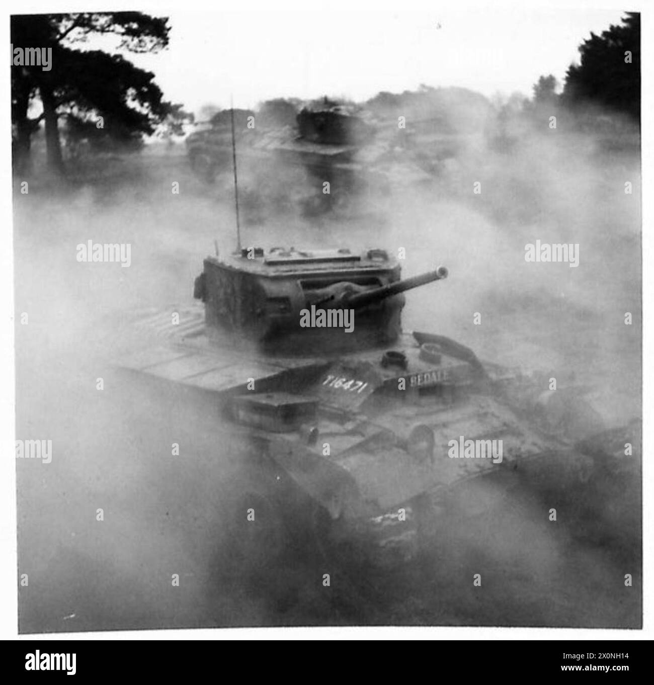 REALISITIC TANK TRAINING - "Valentine" tanks advancing through a smoke ...