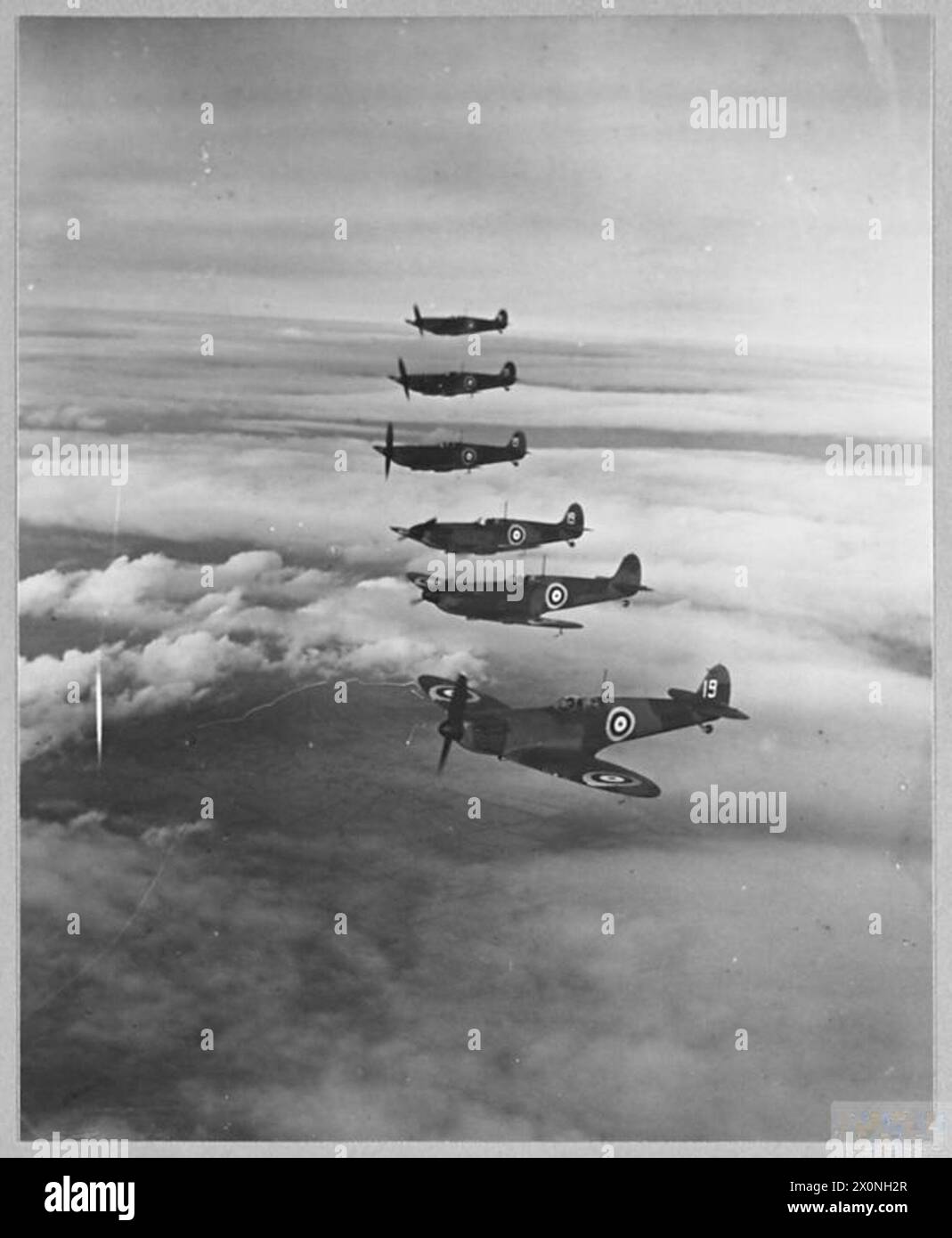 RAF FIGHTER COMMAND - Spitfires of No. 19 Squadron flying in formation ...