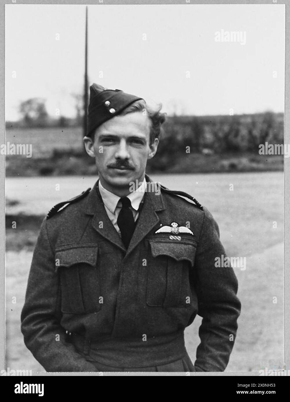 "AUSSIE" LEADS R.A.F. ESCORT SQUADRON - Picture (issued 1945) shows ...