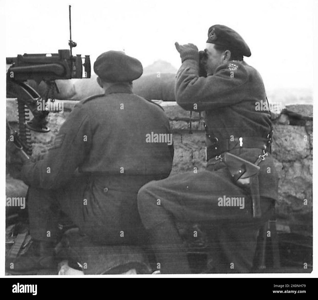 Field Marshal Alexander observes enemy movement in Athens from a tower ...