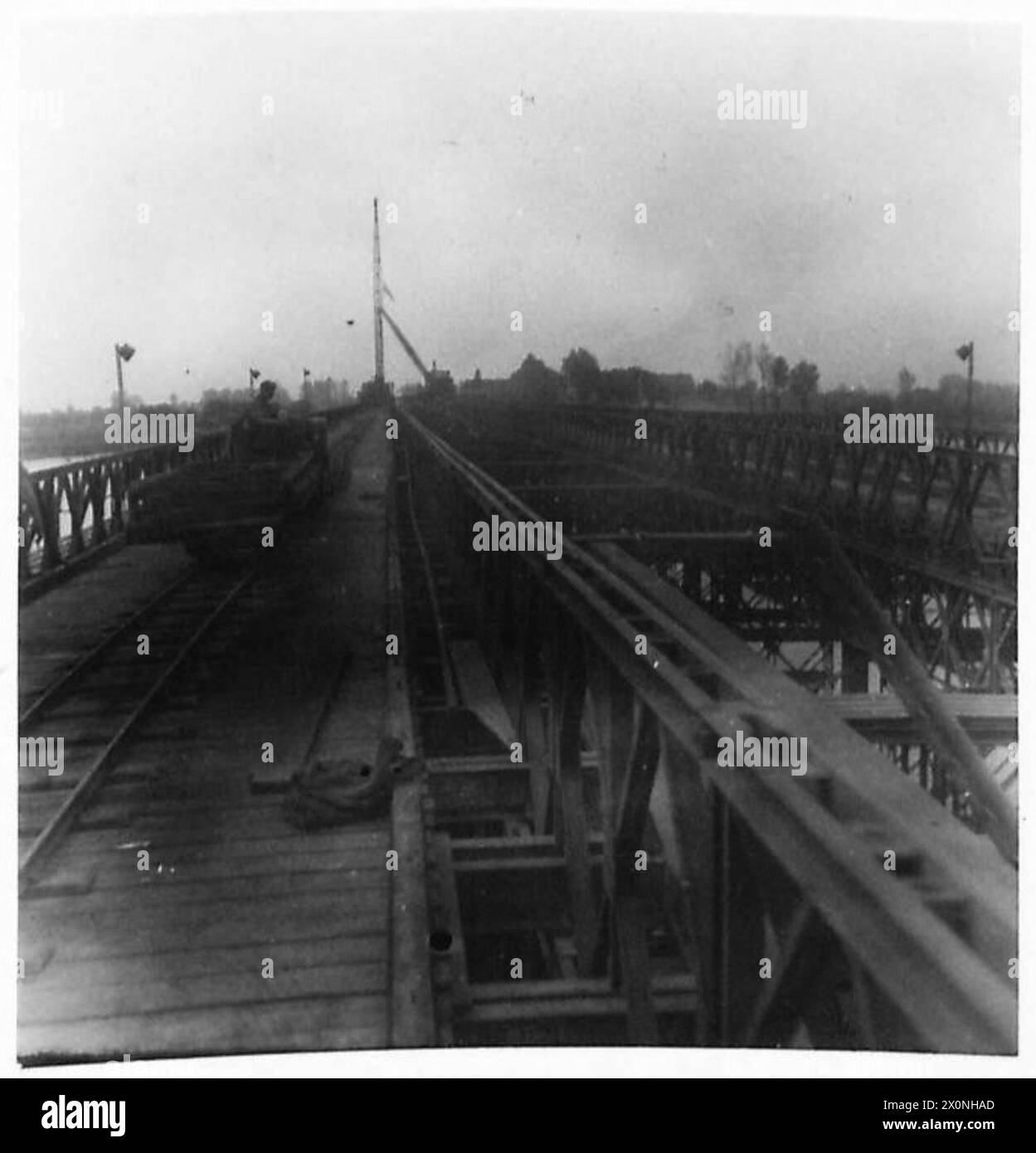 Conveyors are moving along a completed section of a permanent Rhine ...