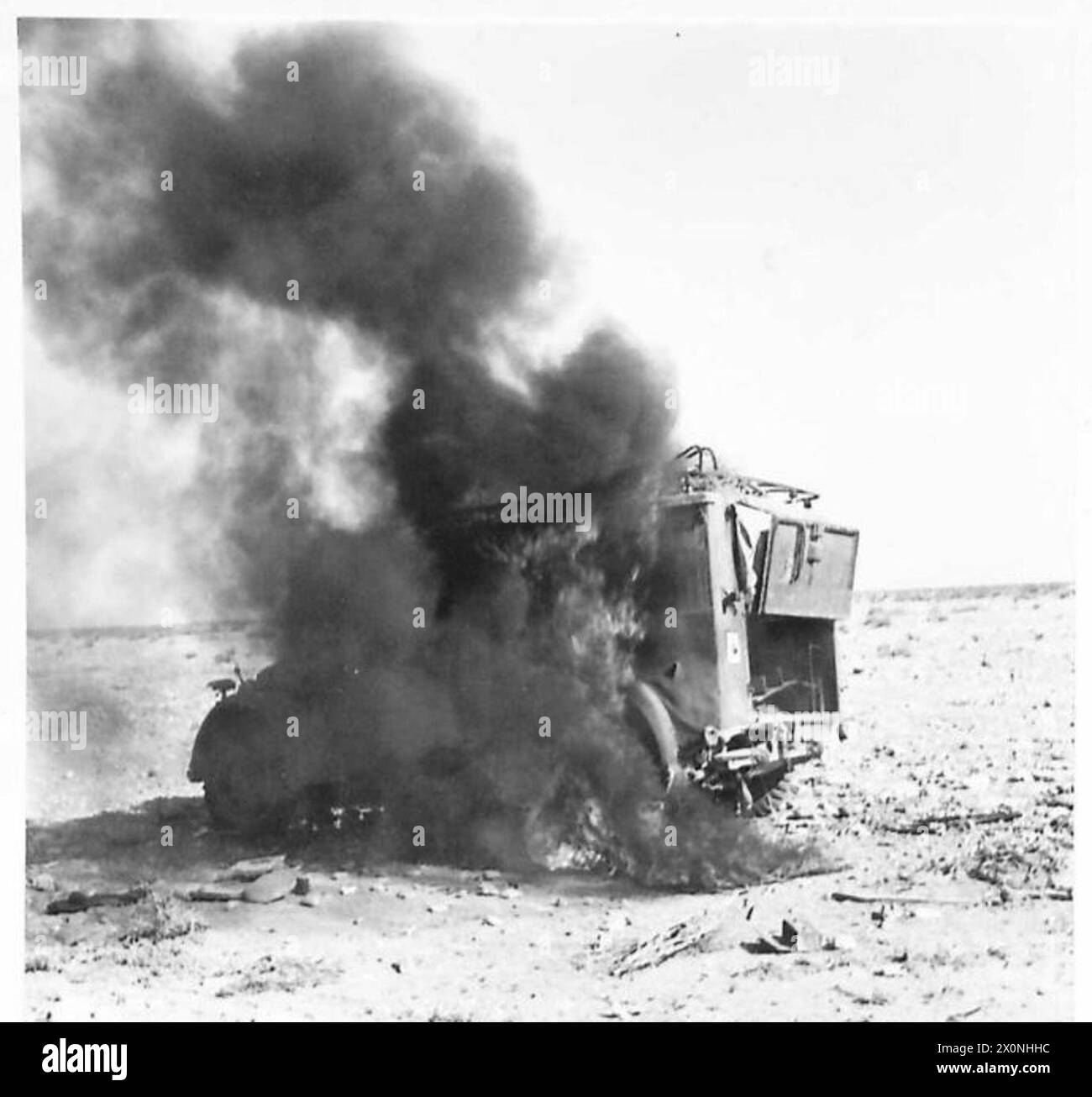 A German wireless truck burns in the Western Desert after being hit by ...